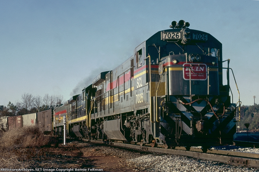 Seaboard Coast Line C30-7 #7026, with U36C #2131 & C30-7 #7091, lead SCL train #333's extra ...